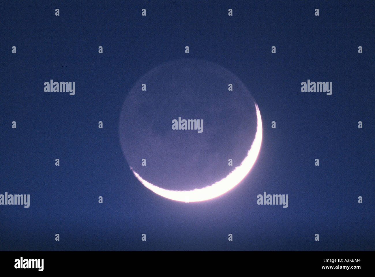 2 day Crescent Moon w Earthshine Stock Photo - Alamy