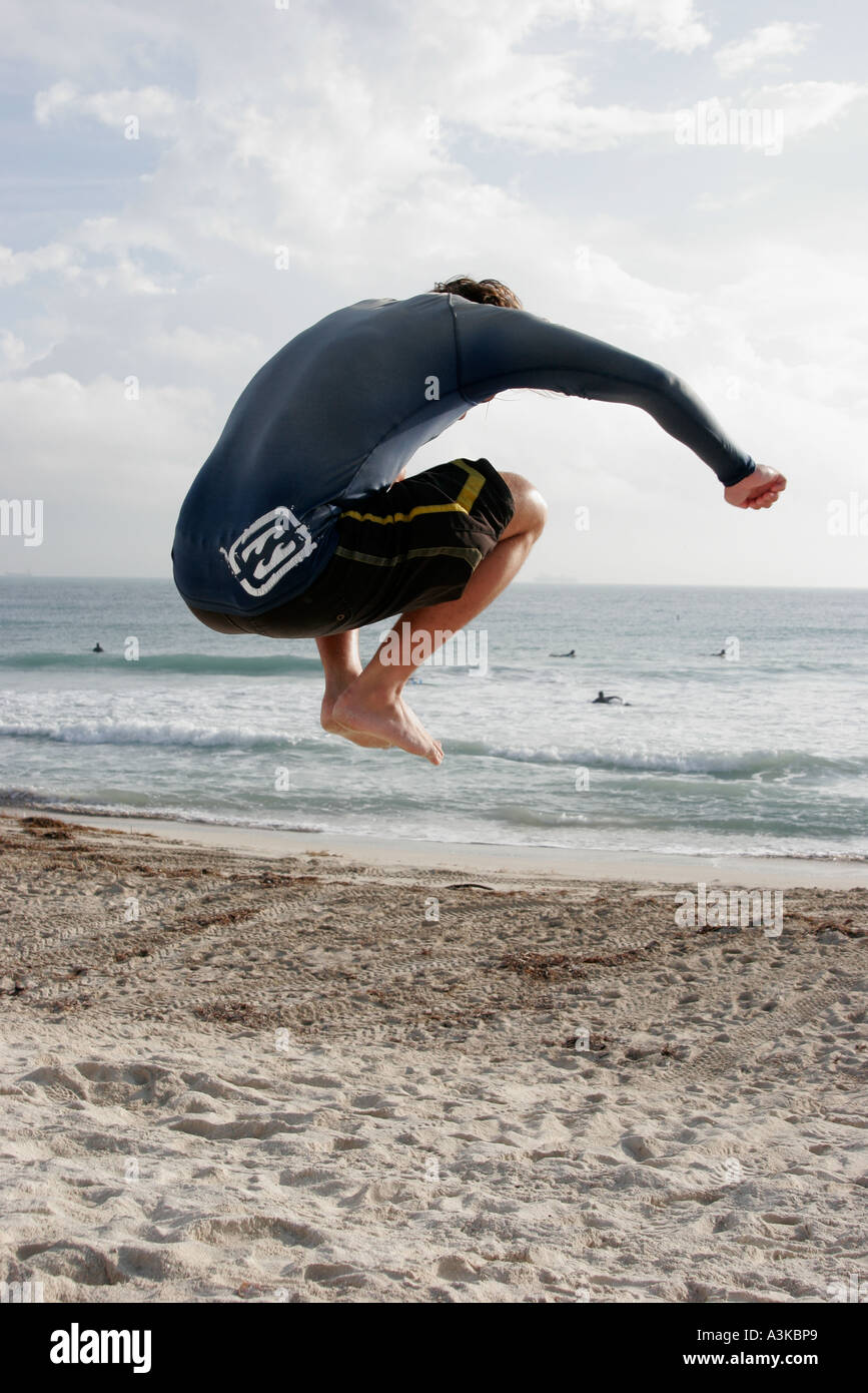 Miami Beach Florida,Atlantic Shore,surfer,jumping,exercise,stretching ...