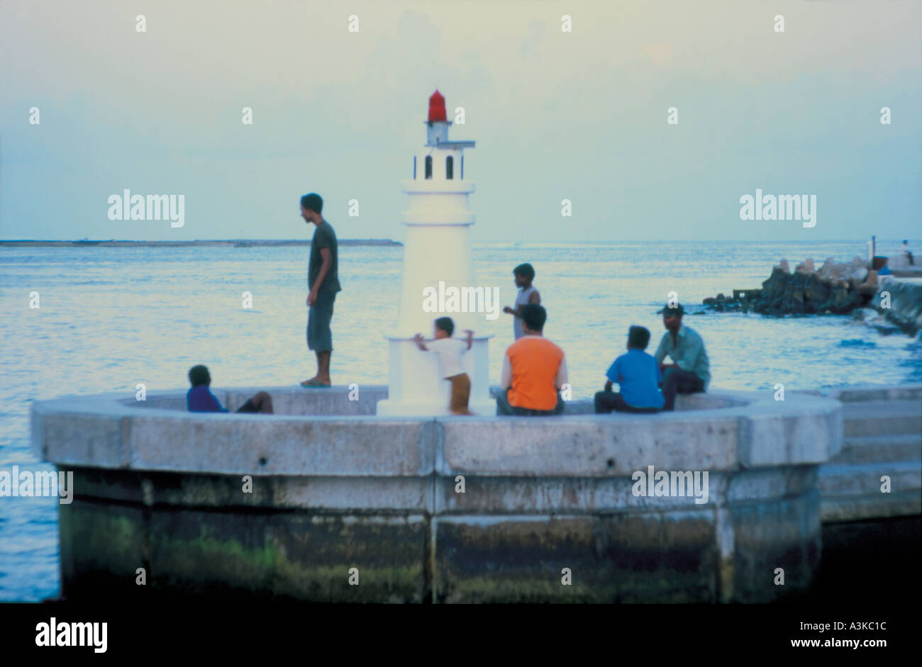 Children playing by the jetty Male Maldives Stock Photo - Alamy