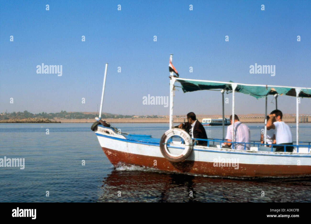 Boat on the river Nile near the old Aswan dam Egypt Stock Photo - Alamy