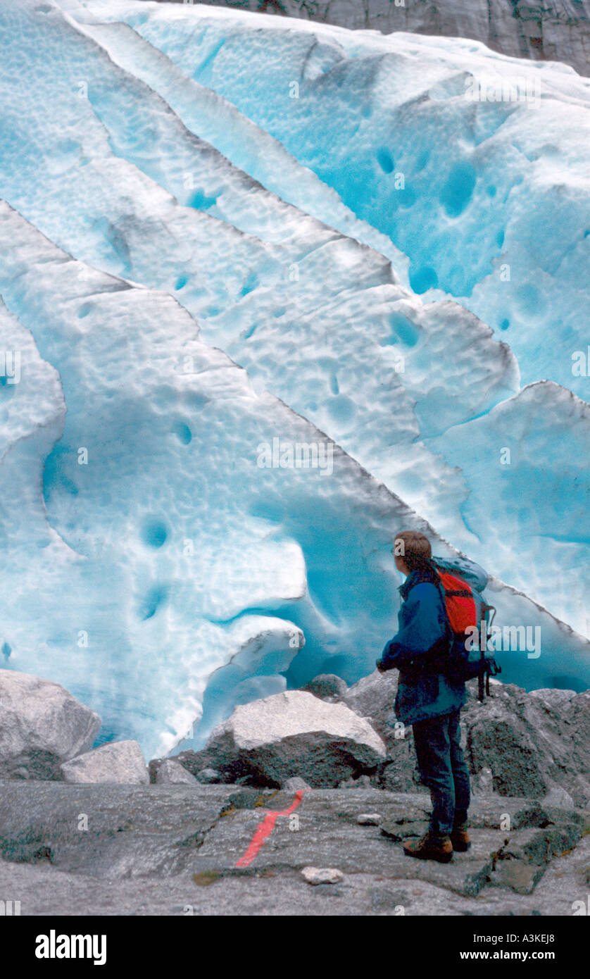 Woman in front of Glacier Ice, Brikdalsbreen, Jostedalsbreen ...