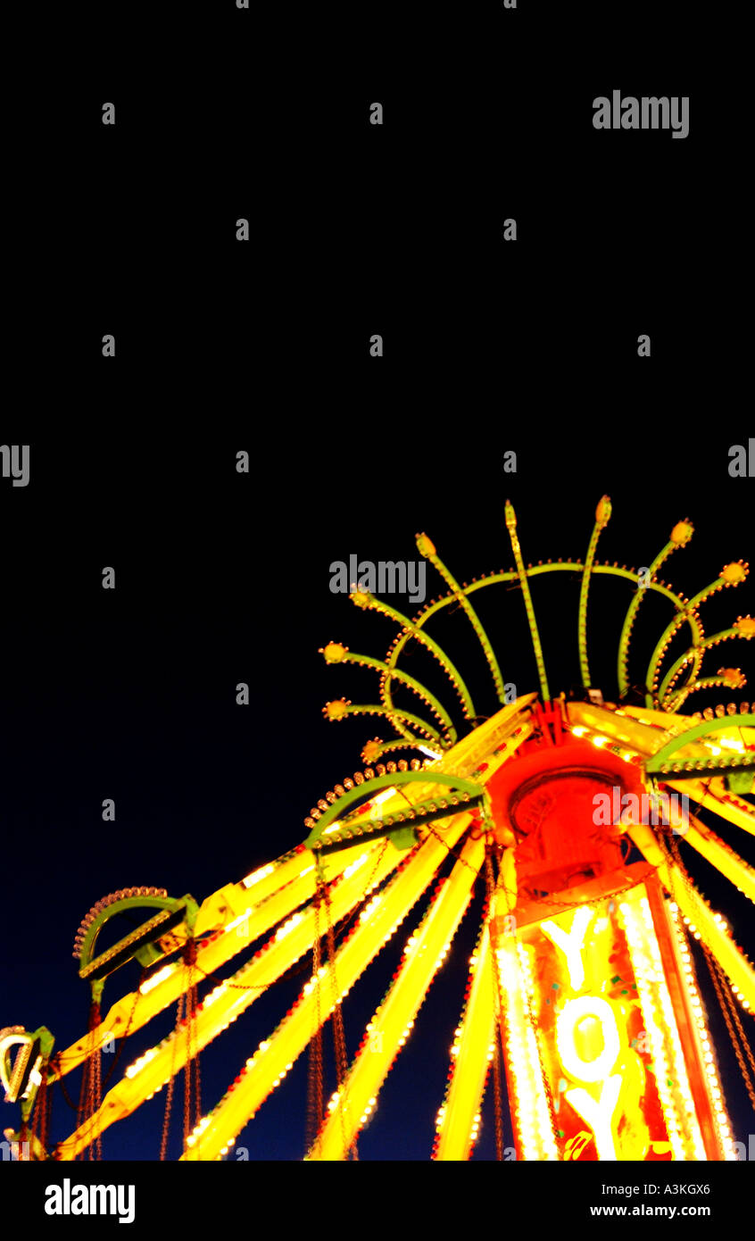 Lights on Yo-Yo amusement park swing ride at night, State Fair ...