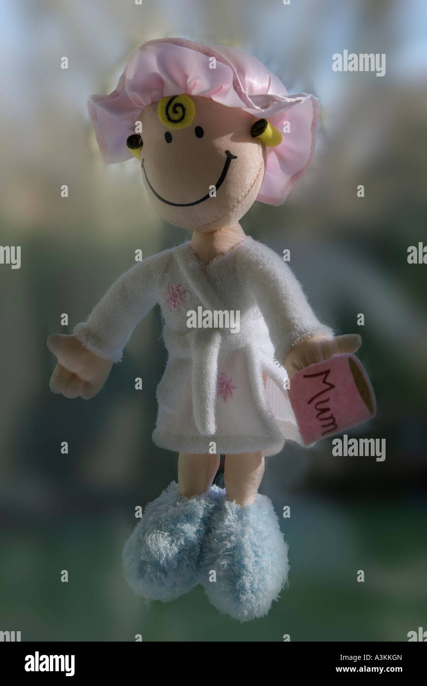 Happy doll in window January 2007 Stock Photo - Alamy