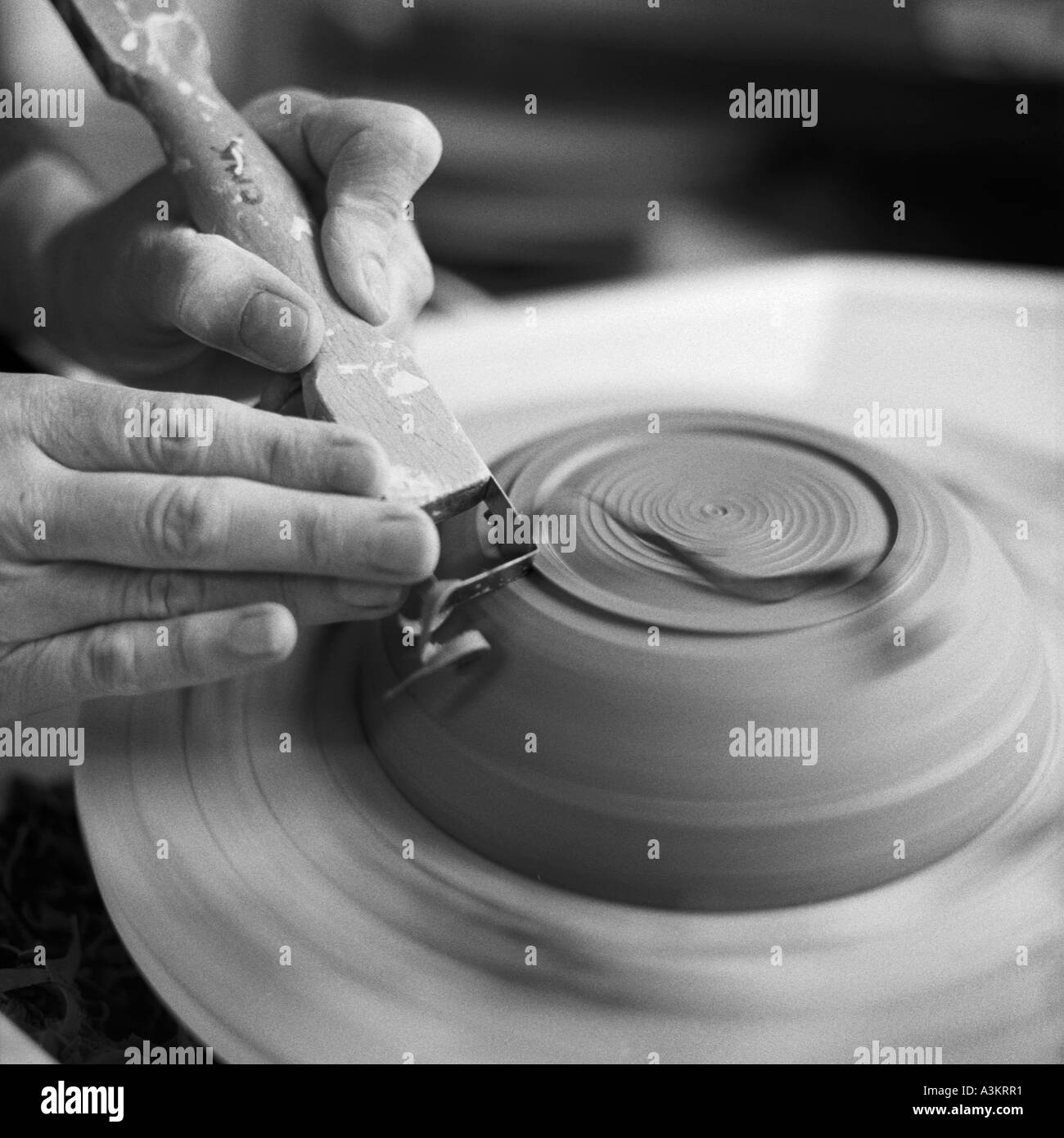 close up of potter's hands turning at the wheel Stock Photo - Alamy