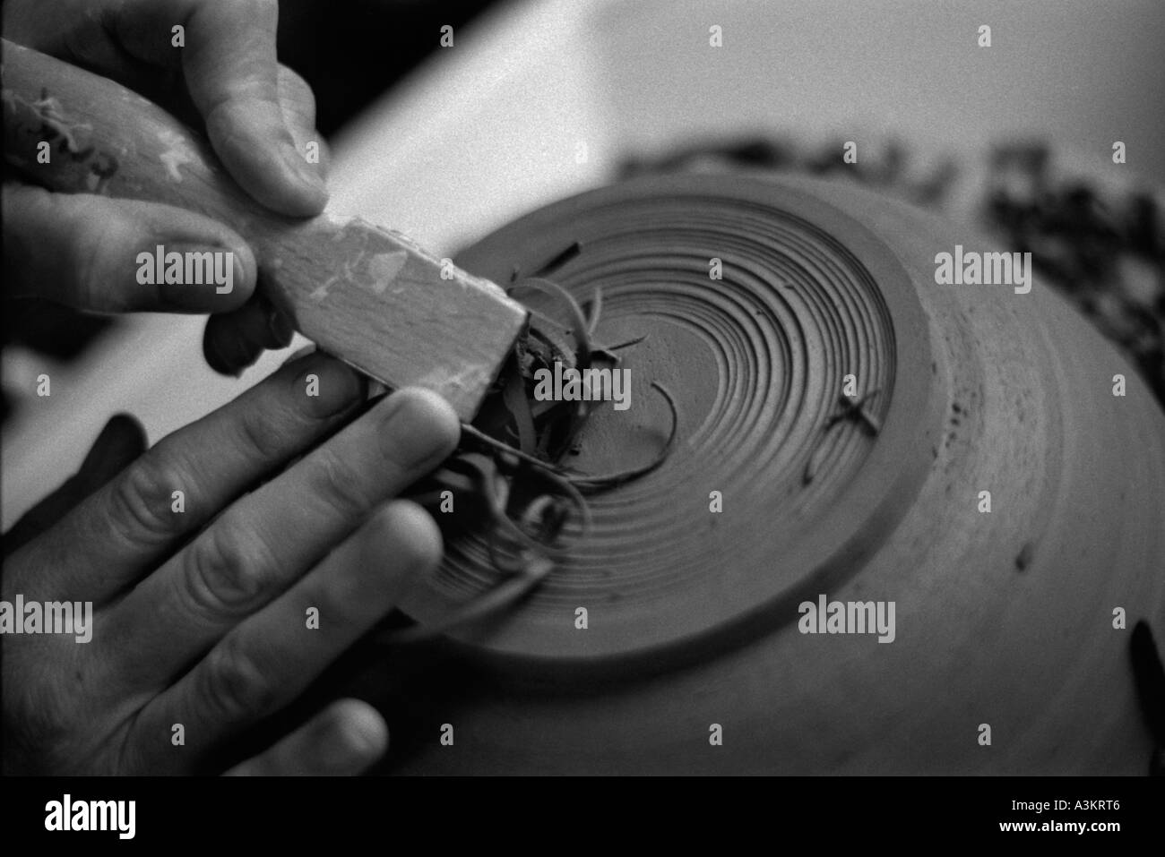 close up of potter's hands turning at the wheel Stock Photo - Alamy