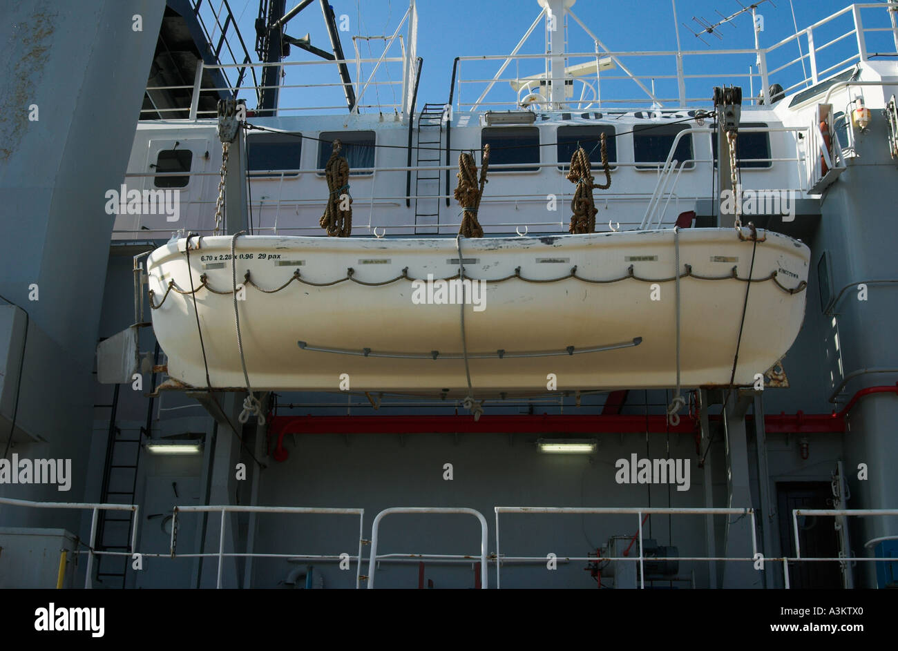 Emergency life raft on a ship Stock Photo - Alamy