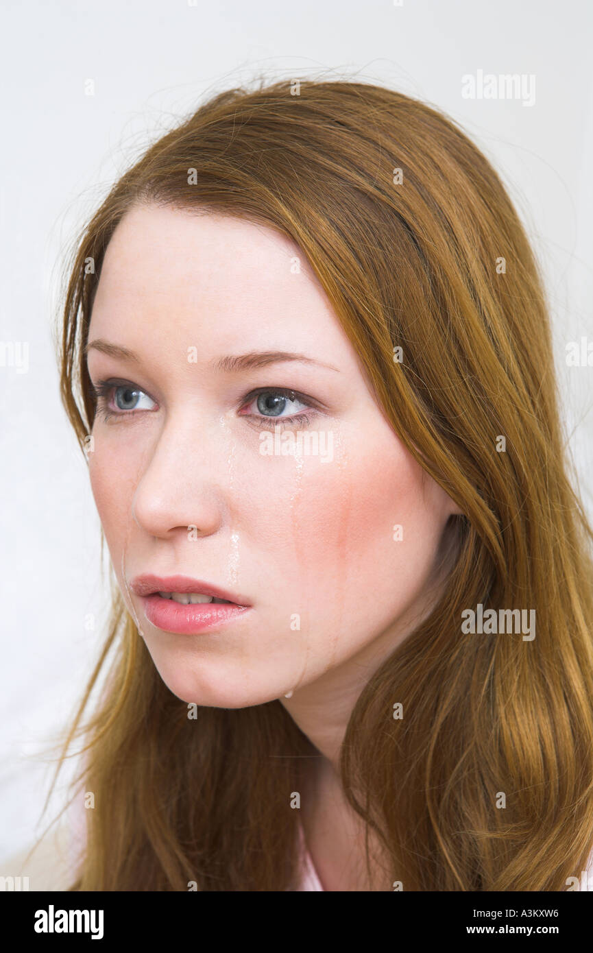 portrait of red haired young woman crying with tearstained eyes Stock ...