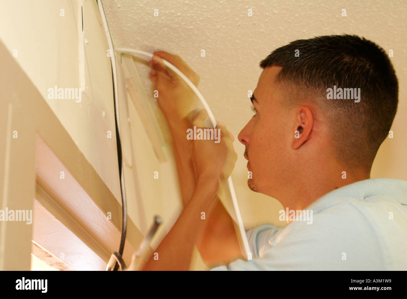 Miami Beach Florida,Hispanic man men male,cable TV installation,coaxial ...