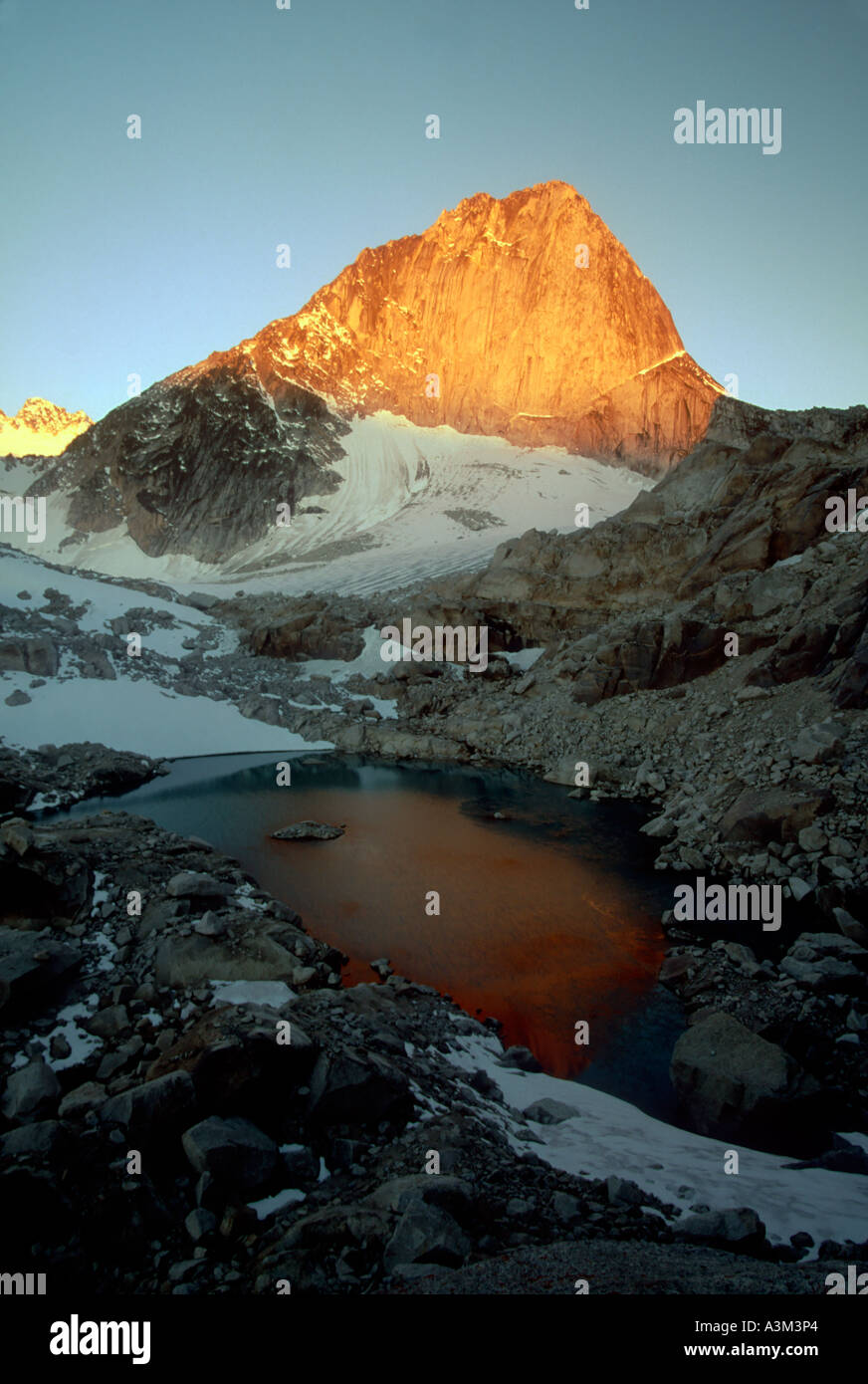 Early light on Bugaboo Spire above a lake in the Purcell Range Bugaboo ...
