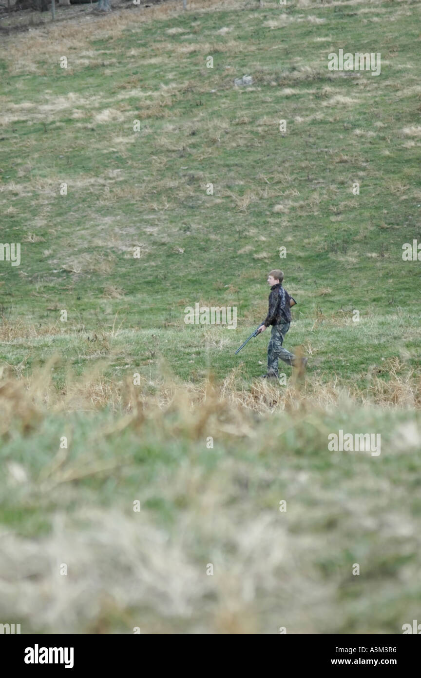 Teenager boy kid gun hi-res stock photography and images - Alamy