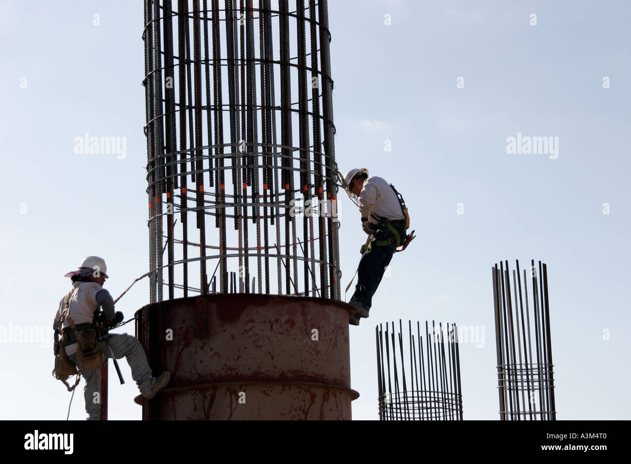 Concrete reinforcing bars men hi-res stock photography and images - Alamy
