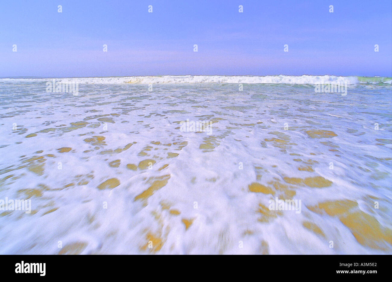nature art ocean foam on the beach Stock Photo - Alamy