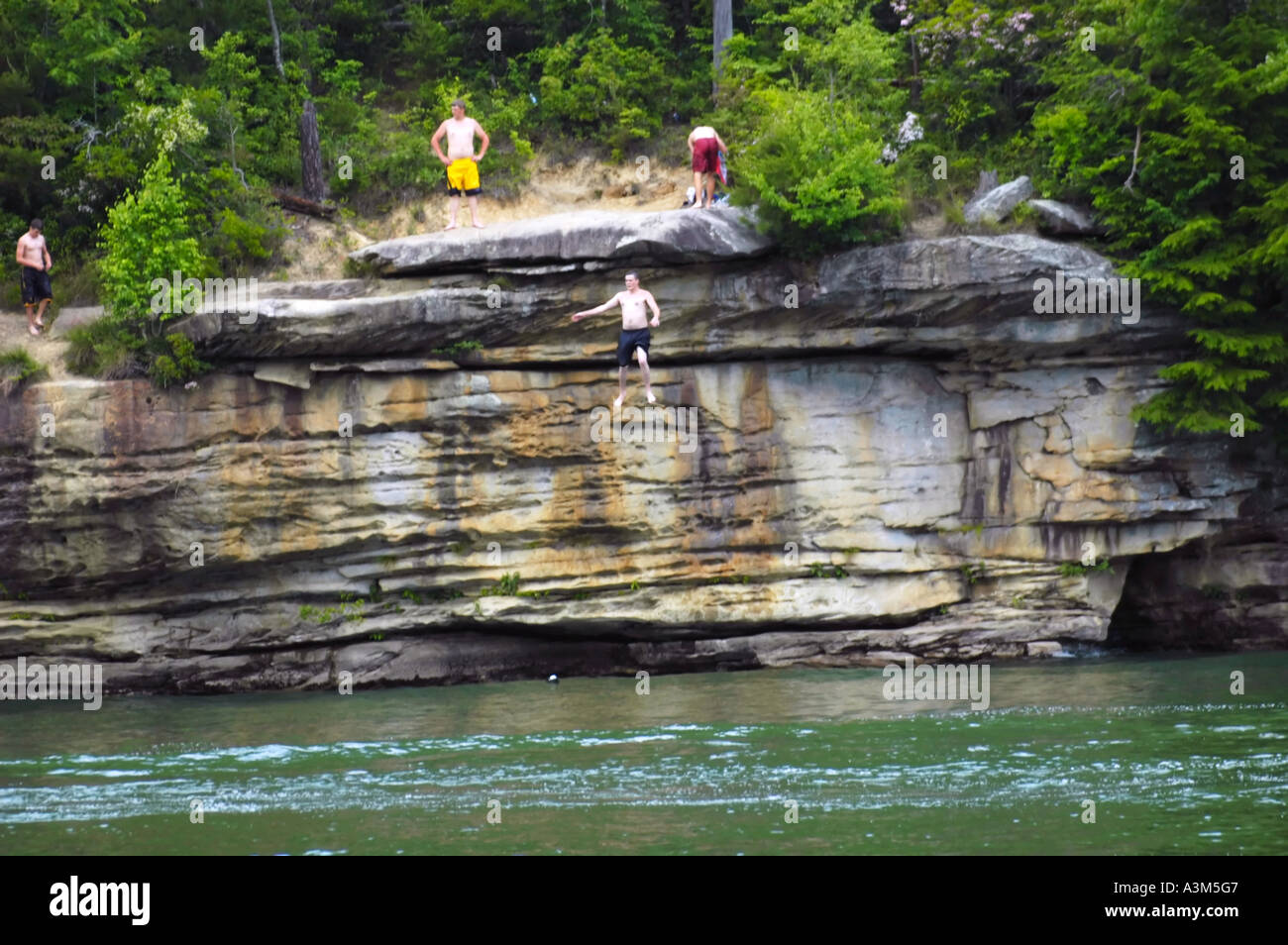 Boy diving into lake hi-res stock photography and images - Alamy