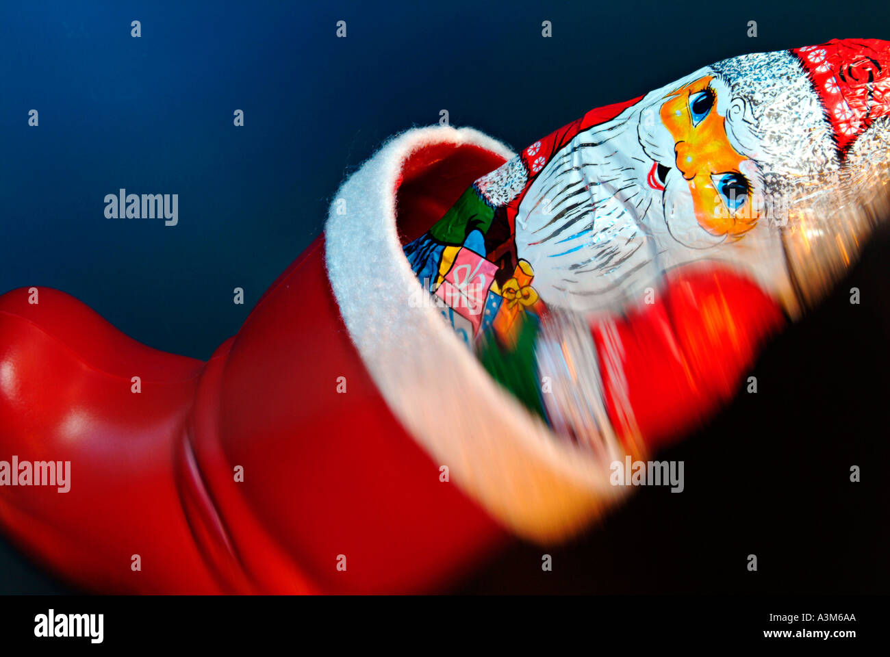Santa Claus made of chocolade in a red boot Stock Photo - Alamy