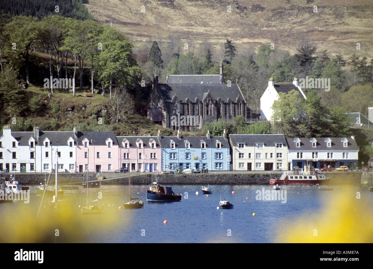 Portree Isle of Skye looking across harbour waterside buildings moored ...