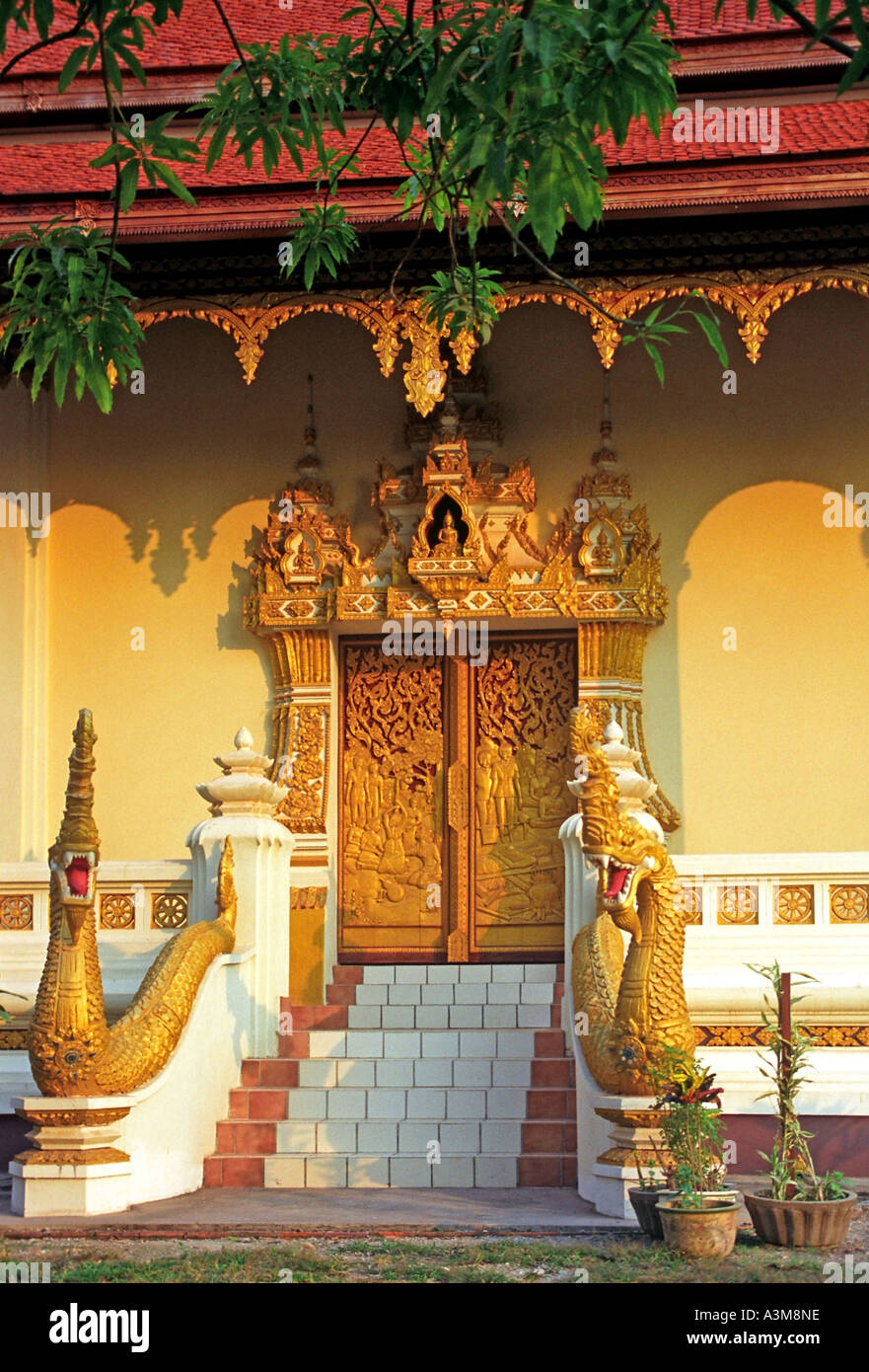 Multi headed naga balustrade and ornate door decoration on a new Wat ...