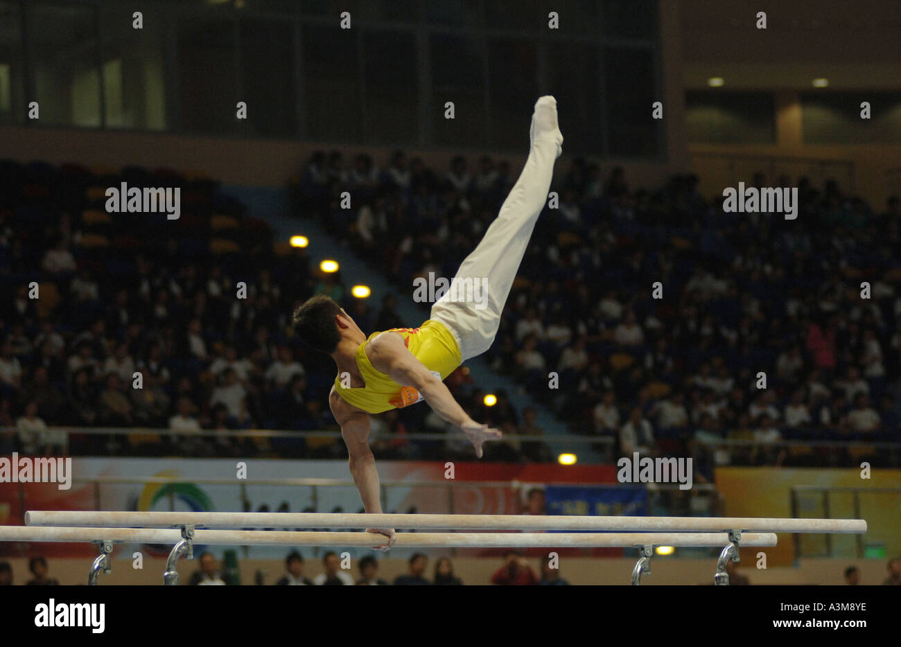 gymnastics competition, parallel bars Stock Photo - Alamy