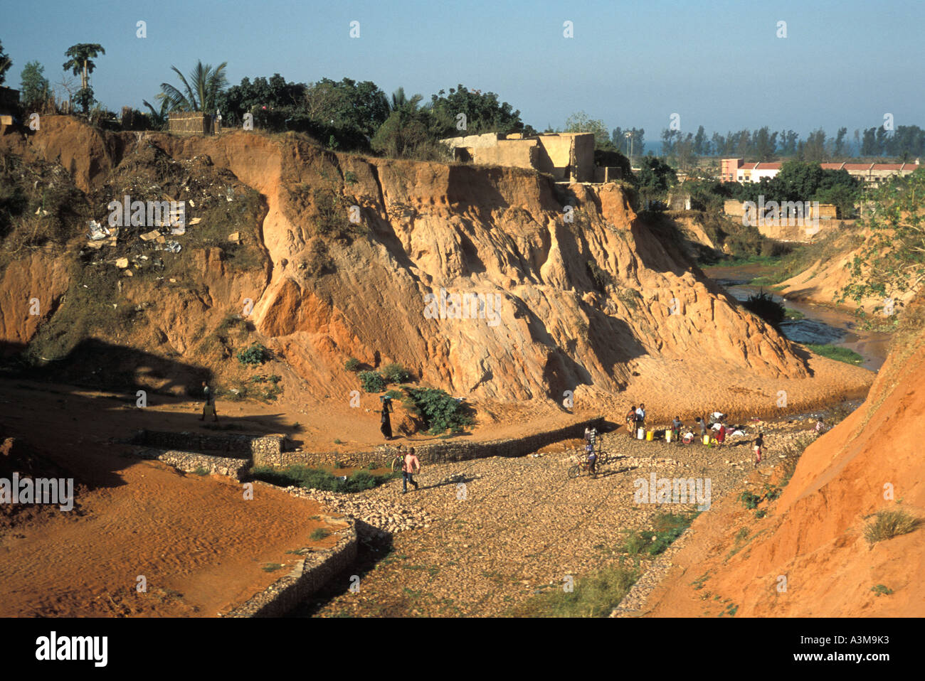 A ravine cut through a poor district of Maputo Mozambique by the floods ...