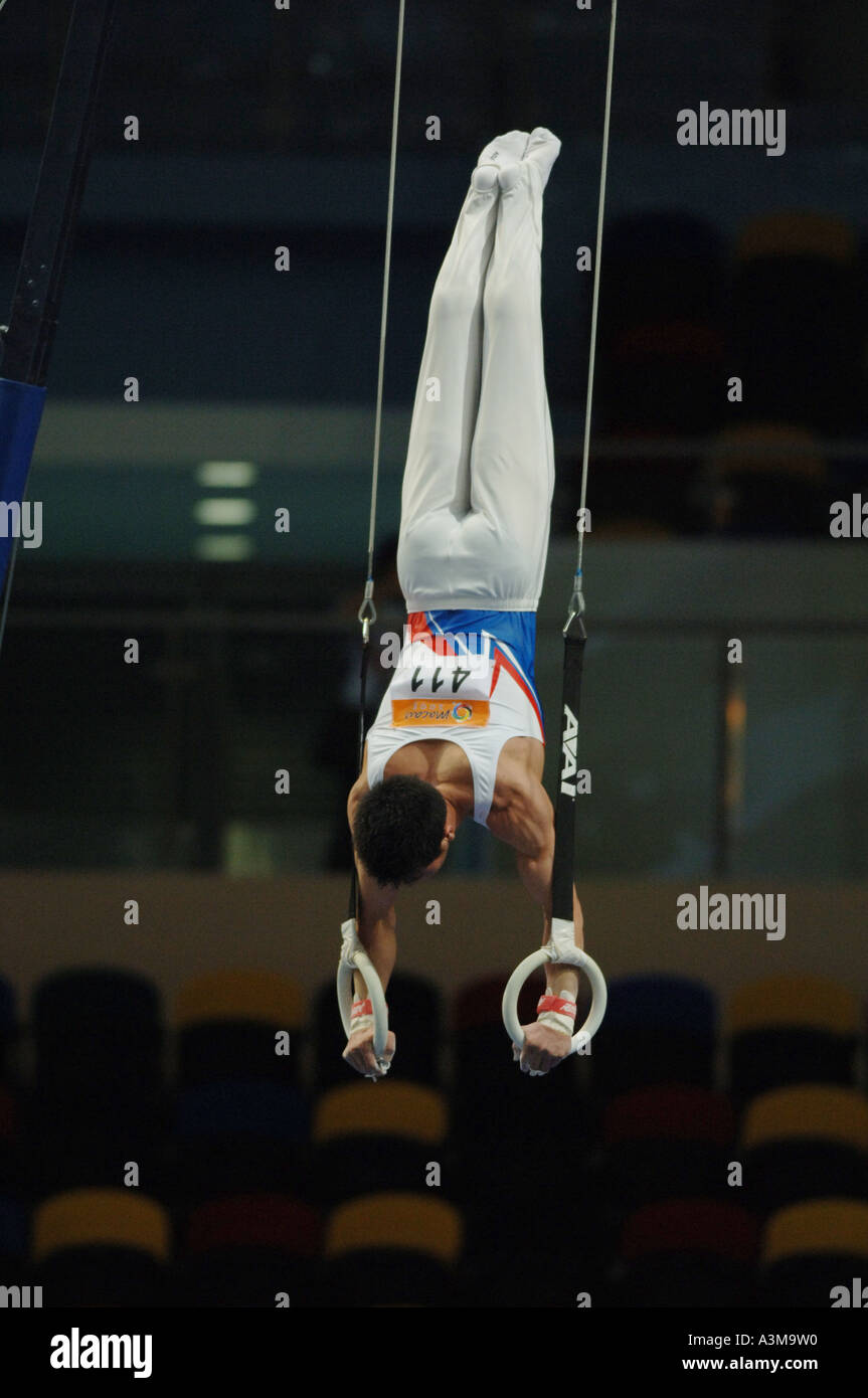 gymnastic athlete on rings Stock Photo - Alamy