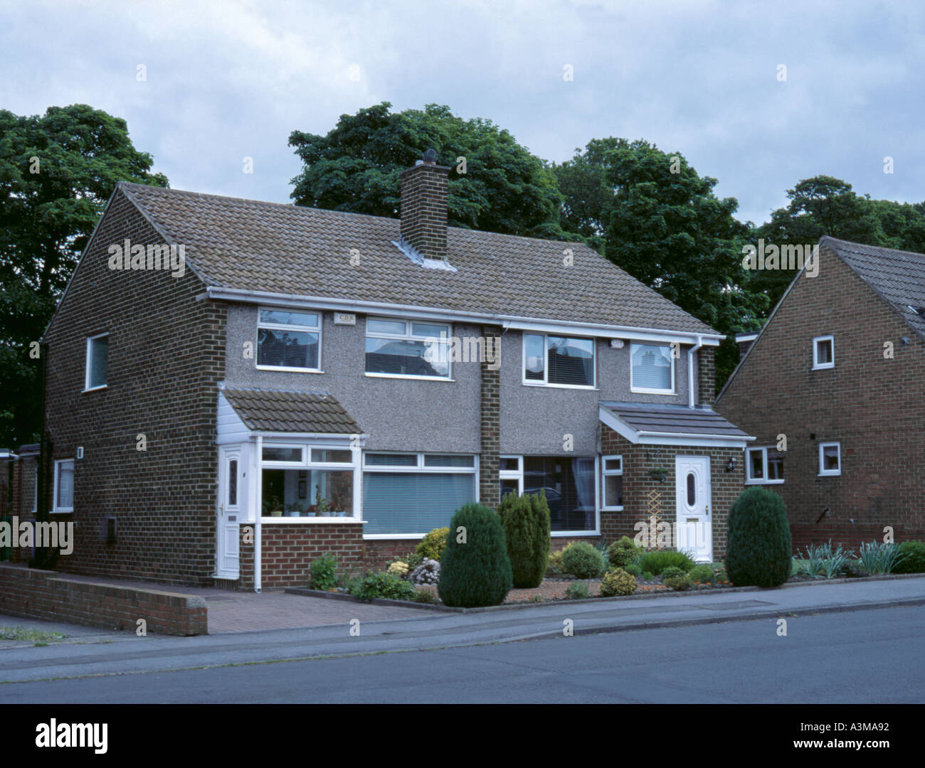 Brick and pebble dashed, brick built, semi-detached houses, England, UK ...