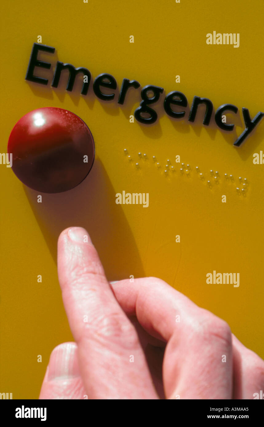 Emergency push button, with standard written English lettering and ...