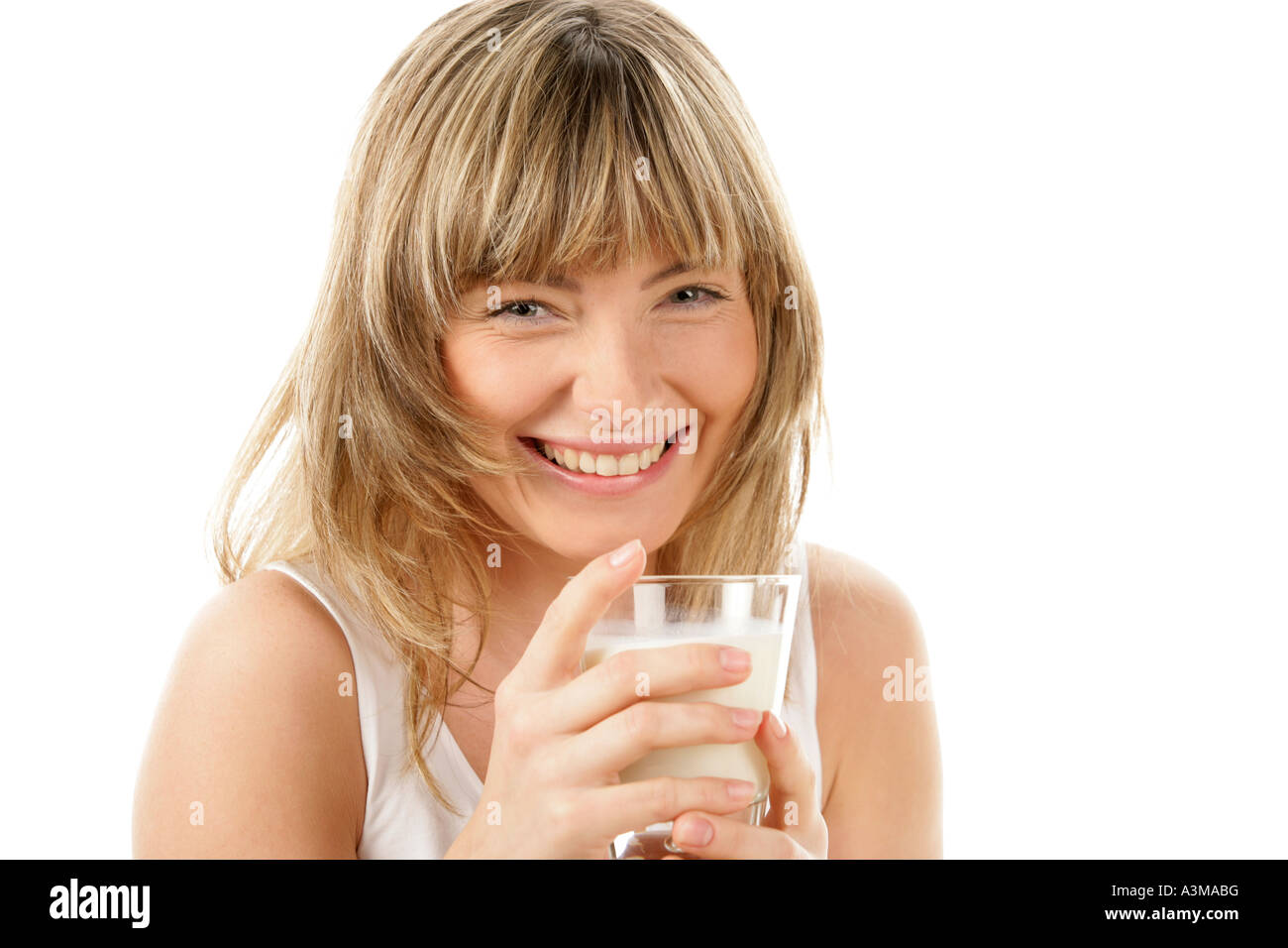 Young woman drinking milk Stock Photo - Alamy