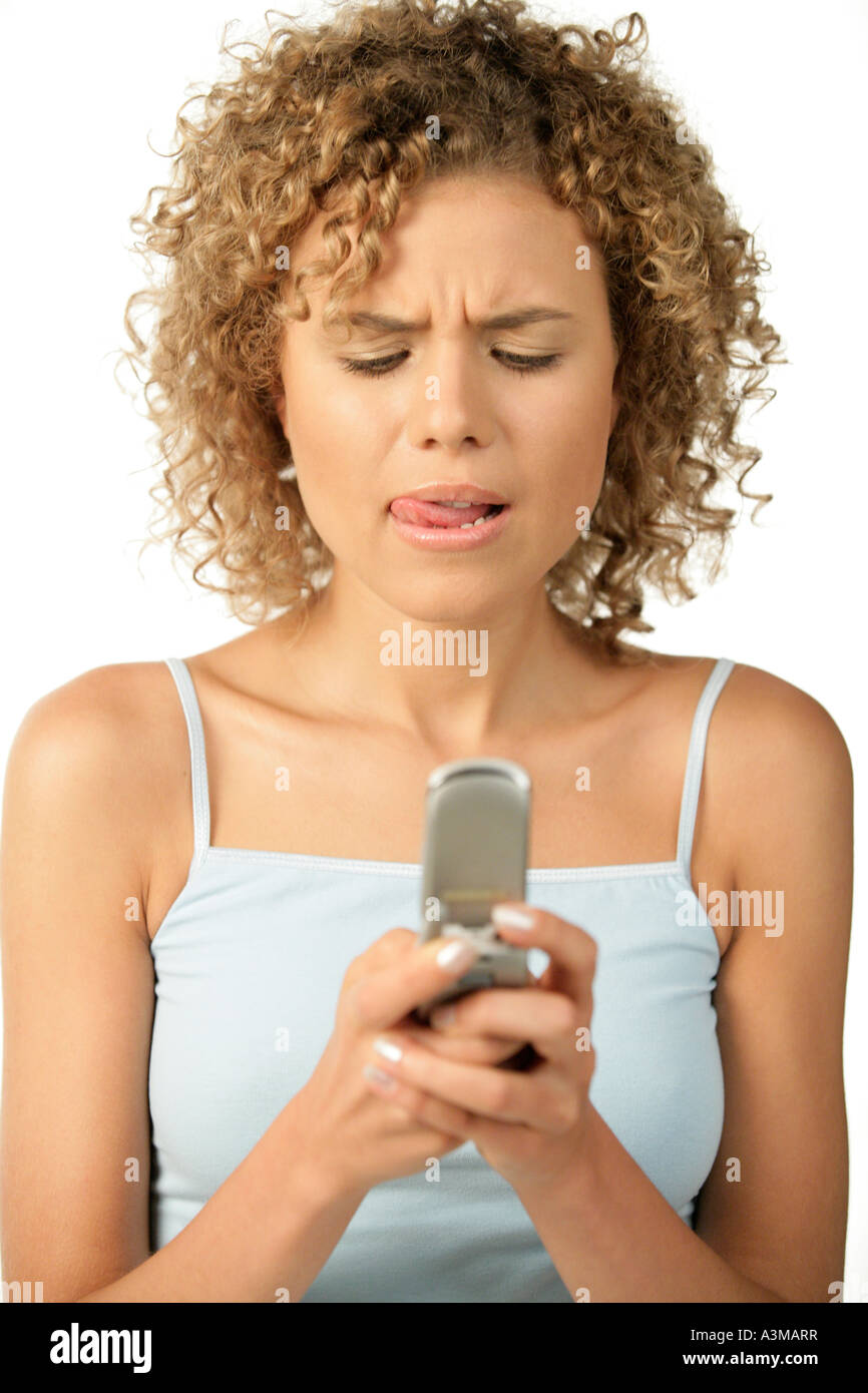 Young woman messaging Stock Photo - Alamy