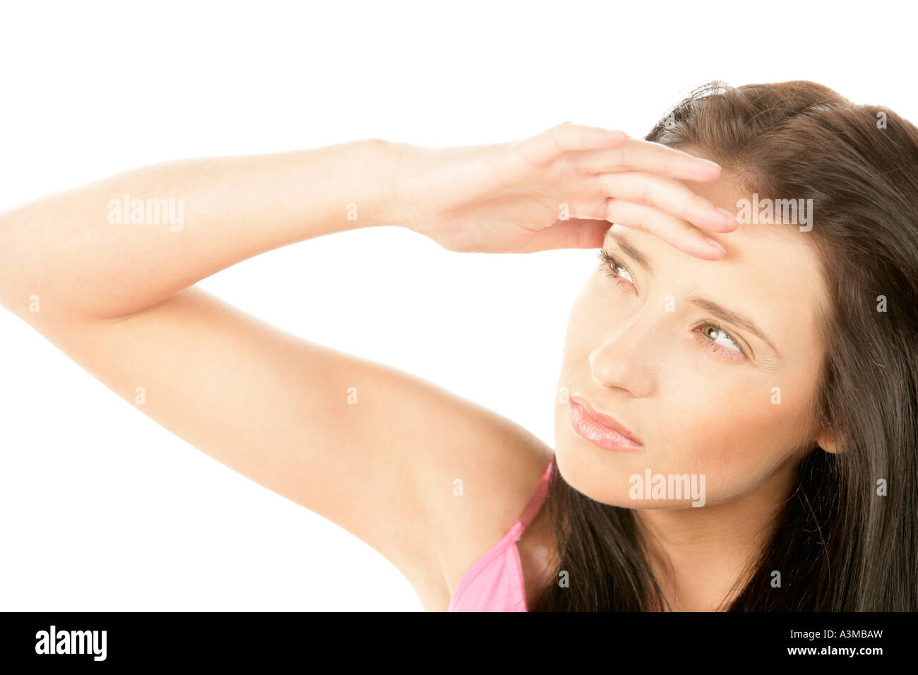Young woman shielding her eyes from light Stock Photo - Alamy