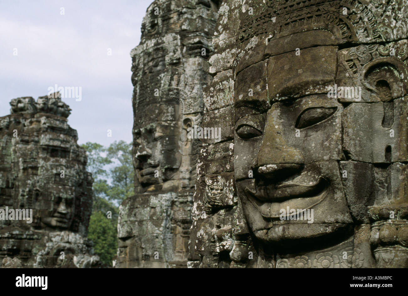 The smile of Angkor. Sculpted from stone, the smiling faces at Bayon ...