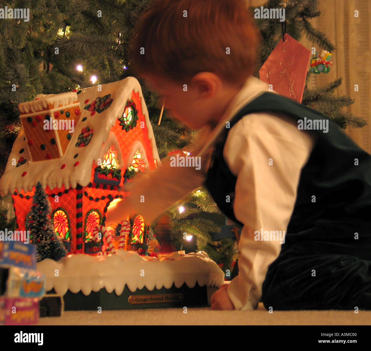 Gingerbread house under tree christmas hi-res stock photography and ...