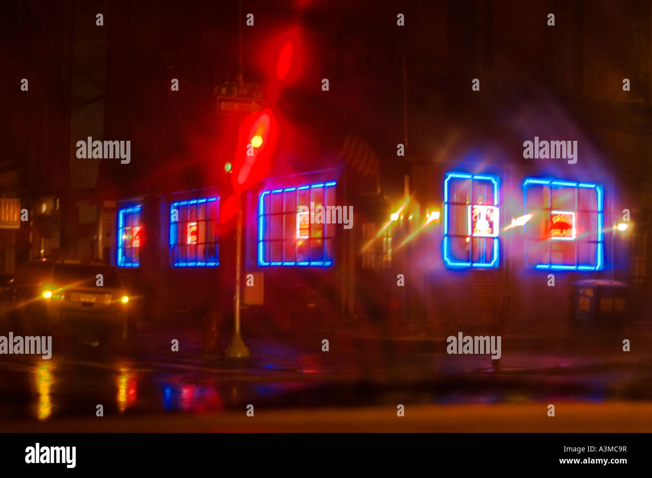 night time city street scene neon lights Stock Photo - Alamy