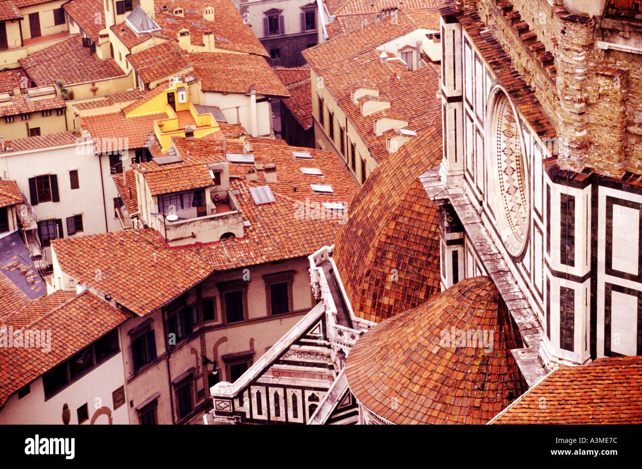 Front plaza side rooftop and ornate walls of Duomo the old city in the ...