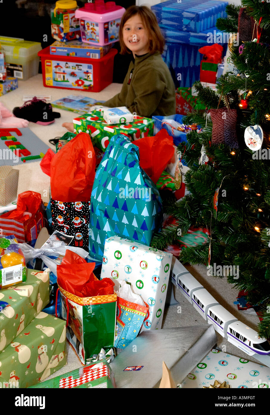 family fun lifestyle Christmas morning day gifts Stock Photo - Alamy