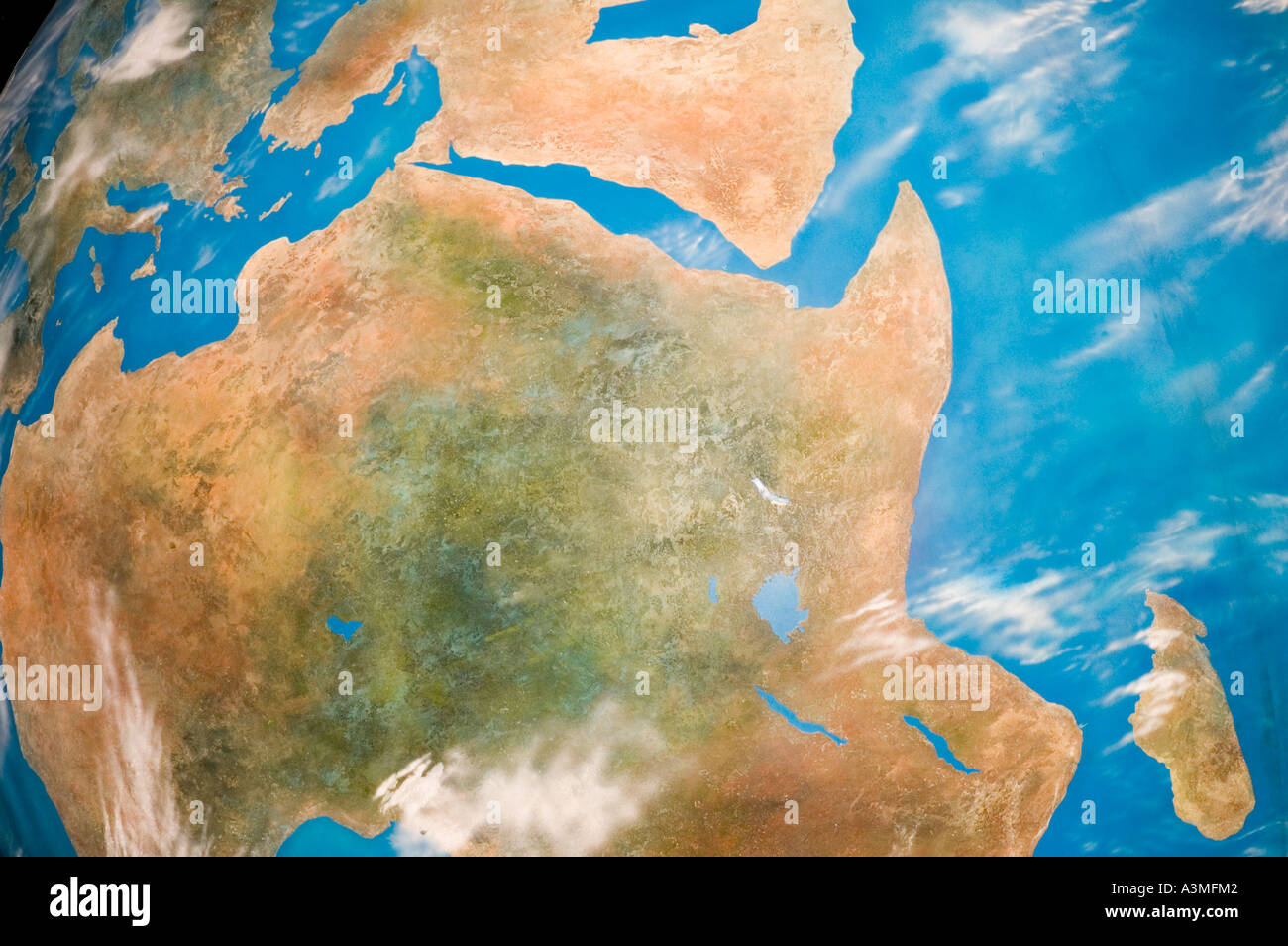 View of Africa and Europe over a scale model earth globe as the Earth ...