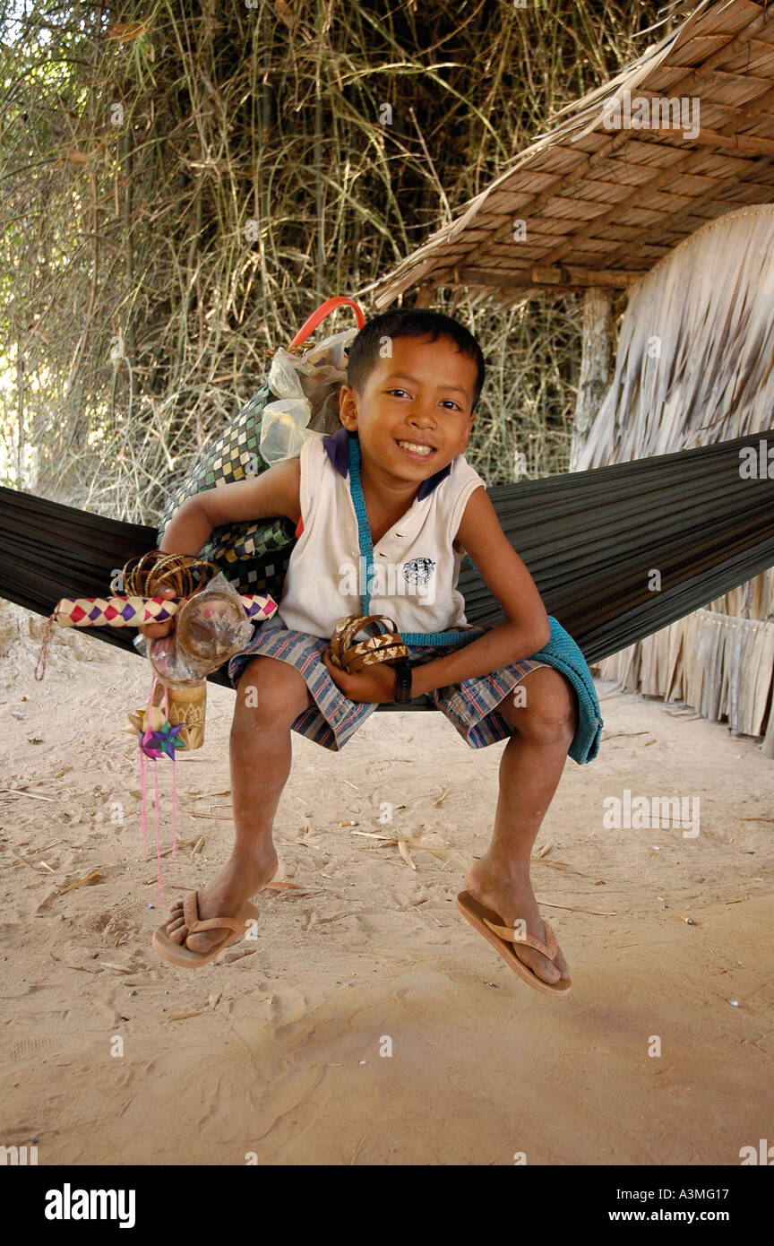 Cambodian Street Vendor Boy Sitting in a Textile Hammock Angkor Wat ...