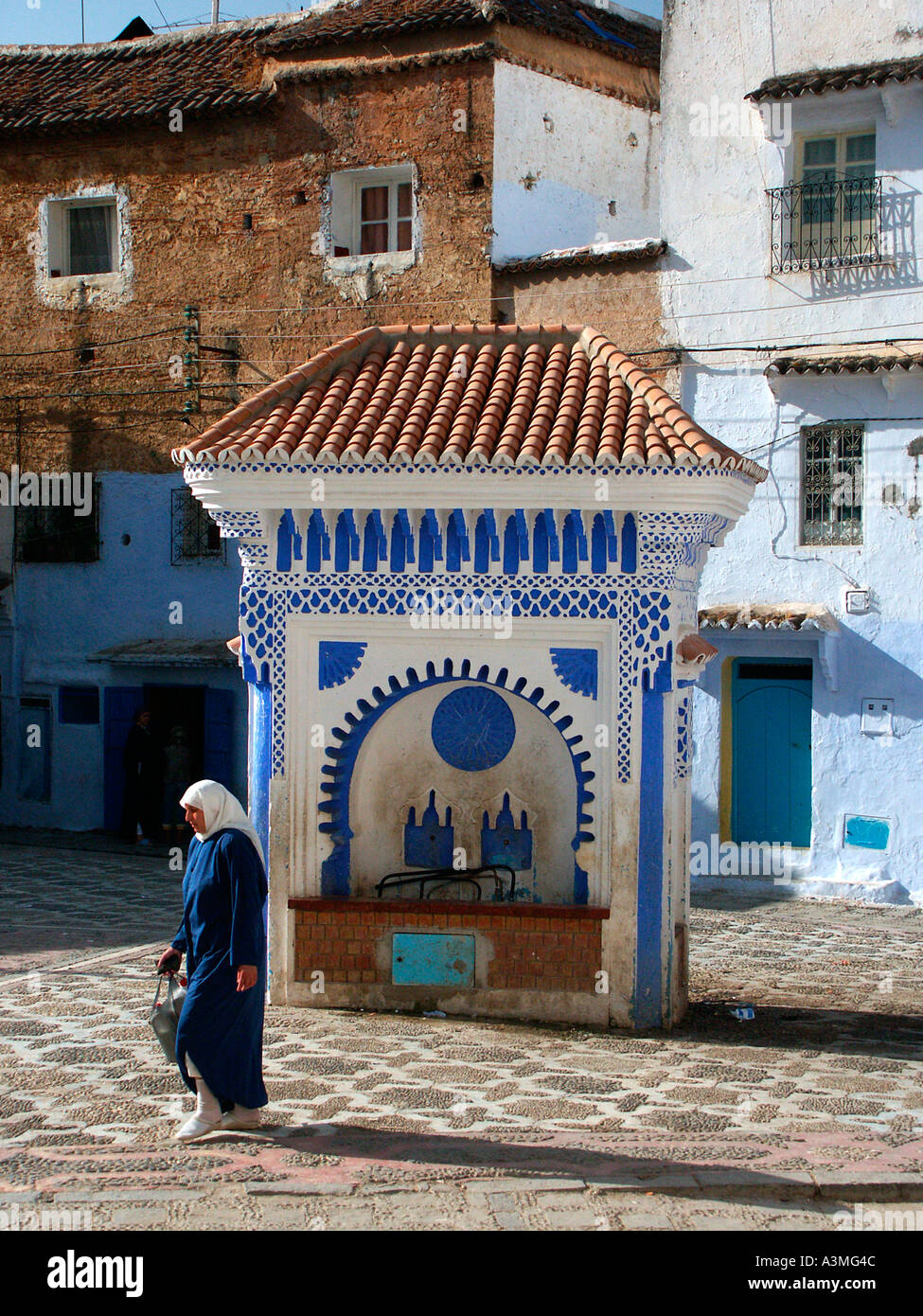 Chefchaouen woman in traditional dress hi-res stock photography and ...