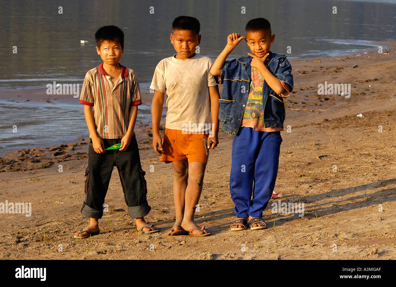 Group of Lao Boys on the Sandy Shore of Mekong River in Louangphrabang ...