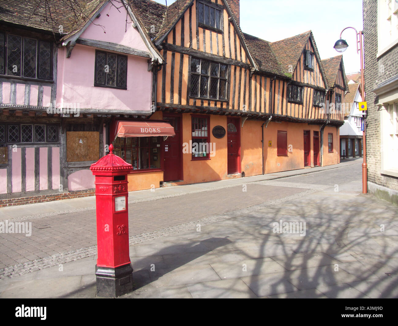 Red post box timber framed Tudor buildings in the centre of Ipswich ...