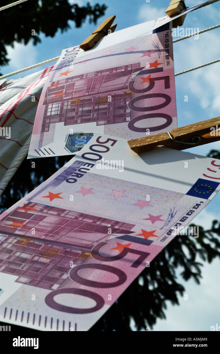 Money Laundering 500 Euro Notes drying on the washing line Stock Photo ...