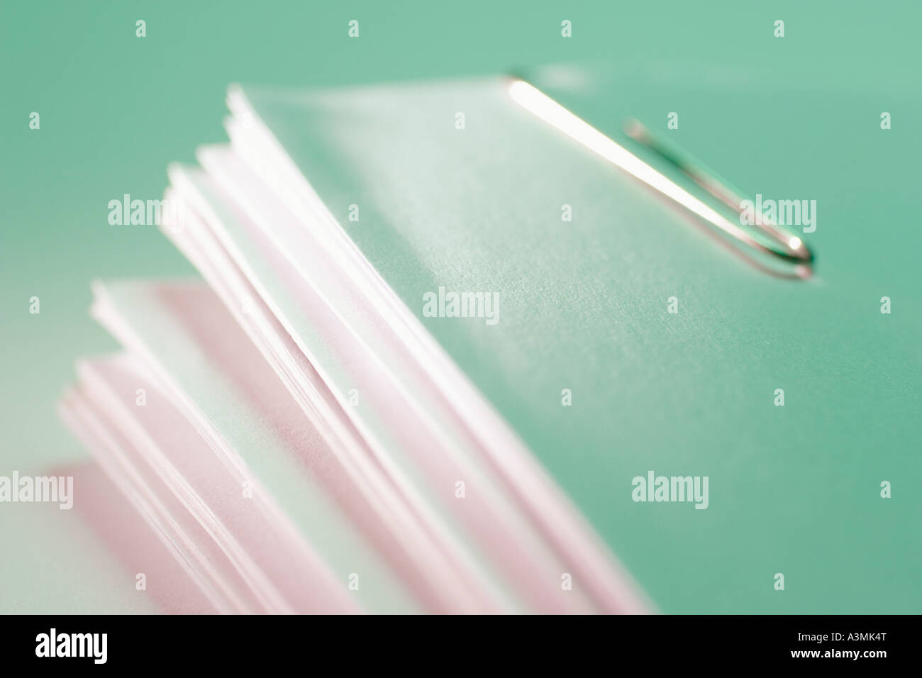 Paperclip with Documents Stock Photo - Alamy