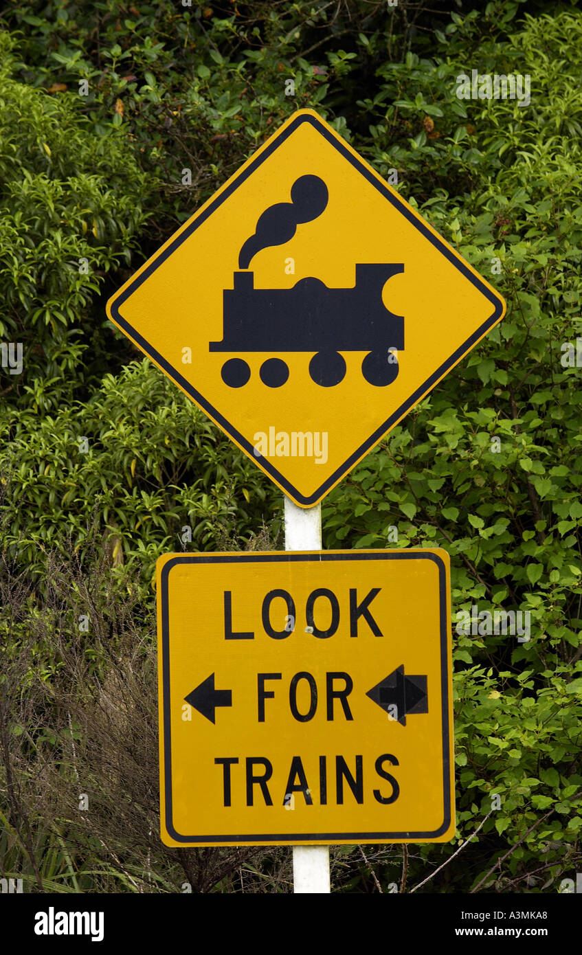 Road traffic sign look for trains on railway crossing North Island New ...