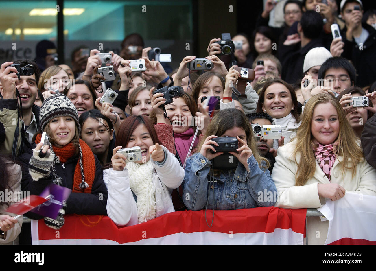 A happy crowd of Essex University Students taking photographs Stock ...