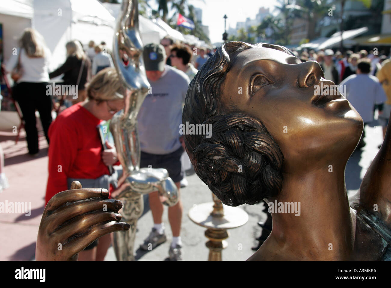 Bronze woman on beach hi-res stock photography and images - Alamy