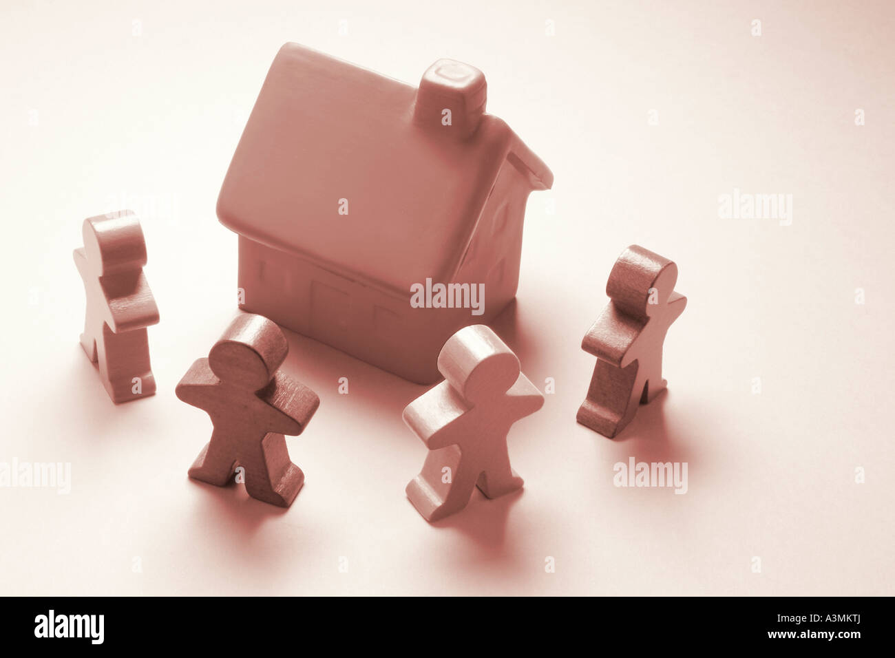 Toy House with Wooden Children Figures Stock Photo - Alamy