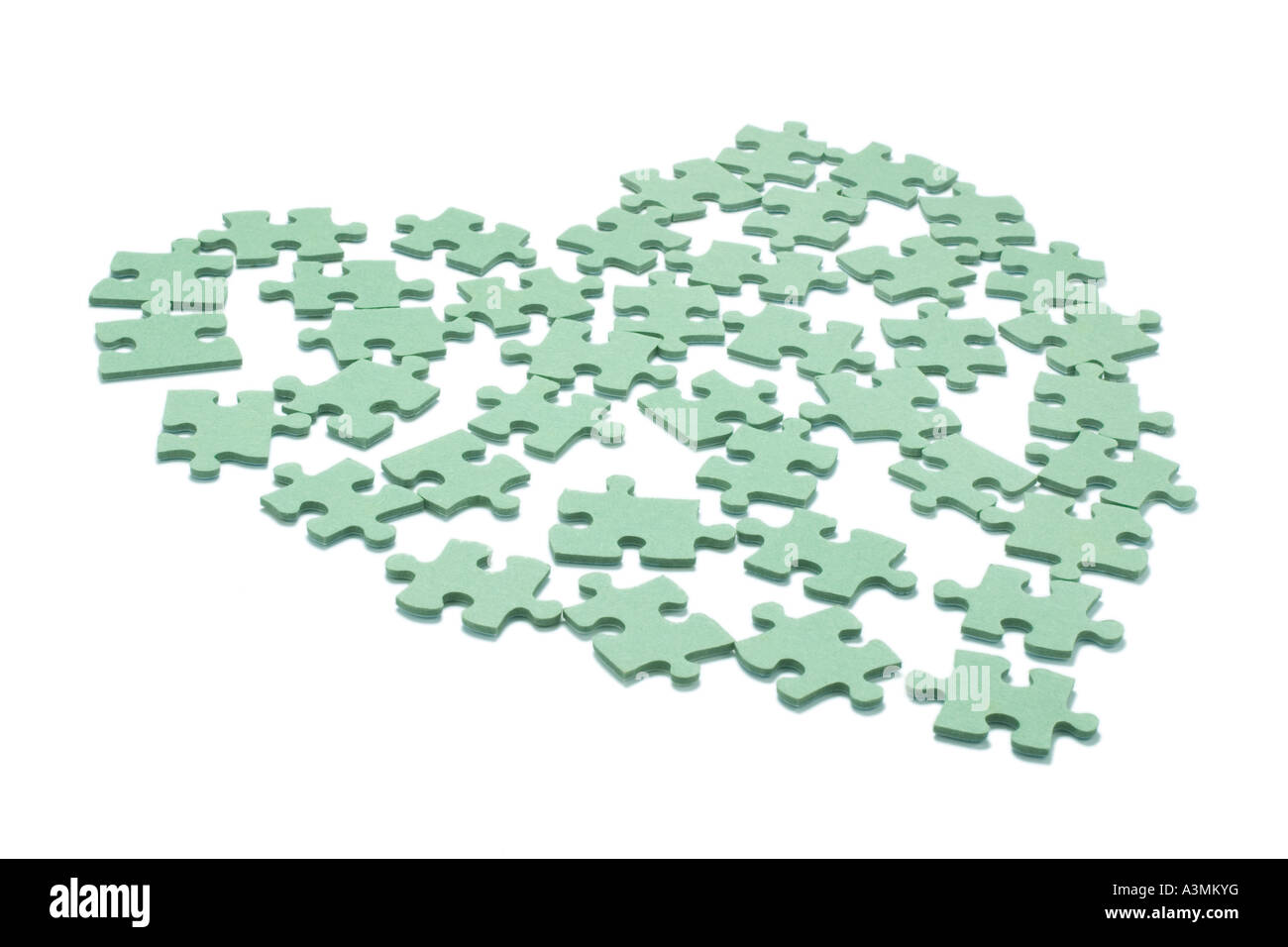 Jigsaw Puzzle Pieces Arranged in Shape of Heart Stock Photo - Alamy