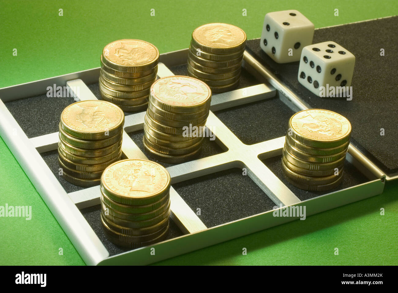 Coins on Game Board Stock Photo - Alamy