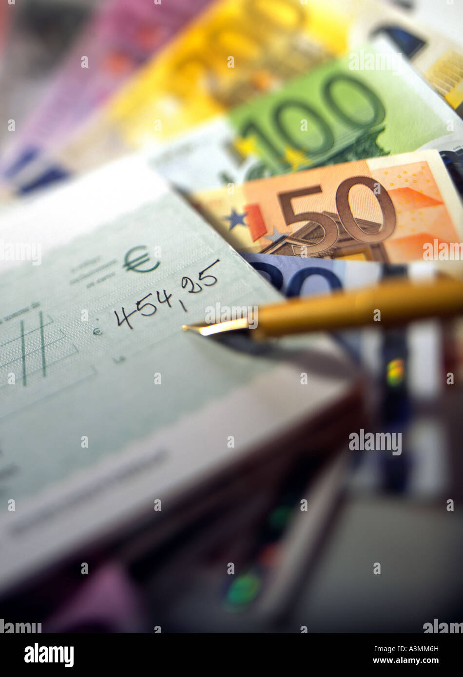 PEN ON EURO CHEQUEBOOK EURO BANKNOTES Stock Photo - Alamy