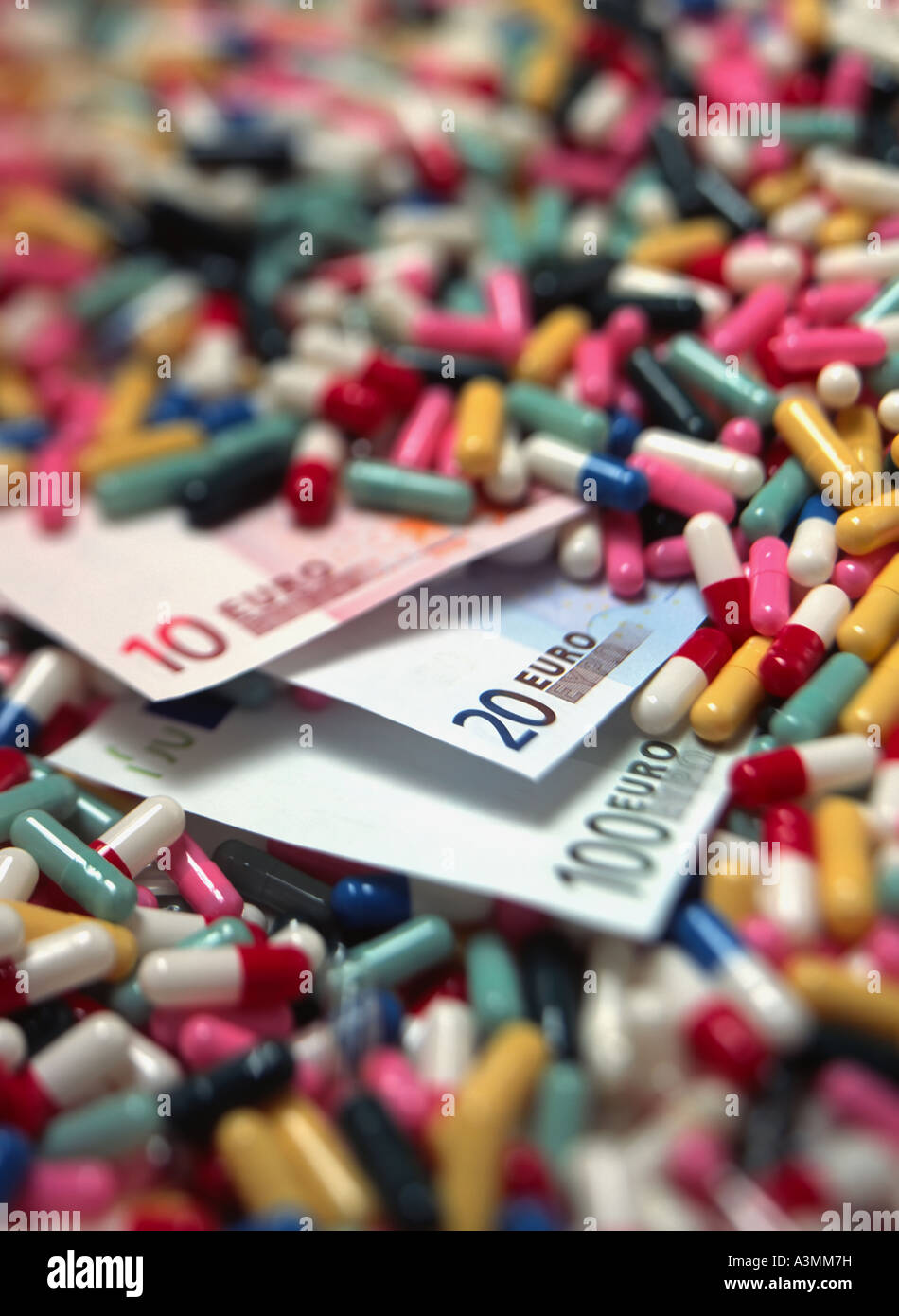 EURO BANKNOTES AMONG DRUG CAPSULES Stock Photo - Alamy