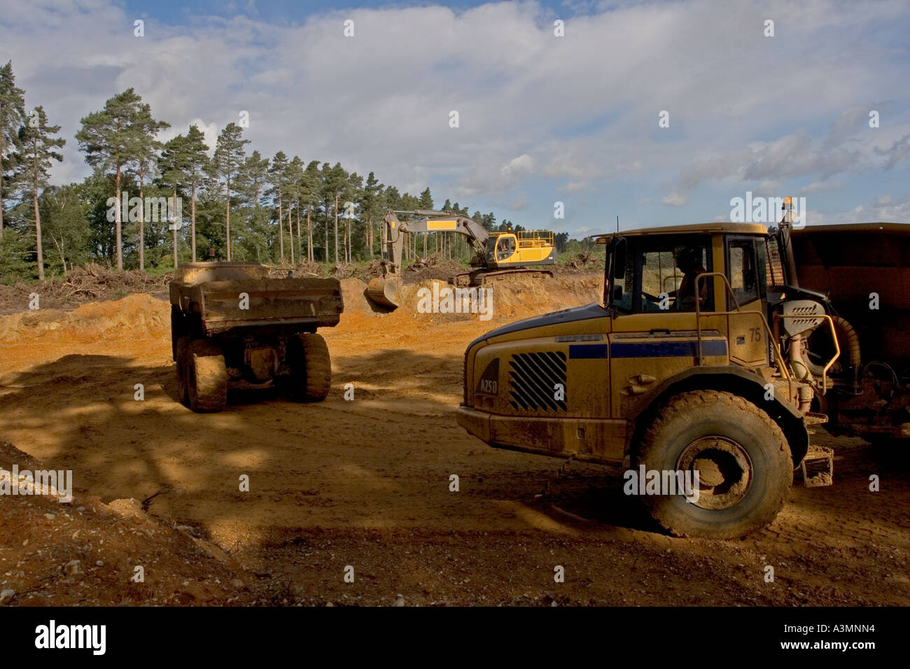 Mining sandstone gravel from quarry, which will be restored to ...