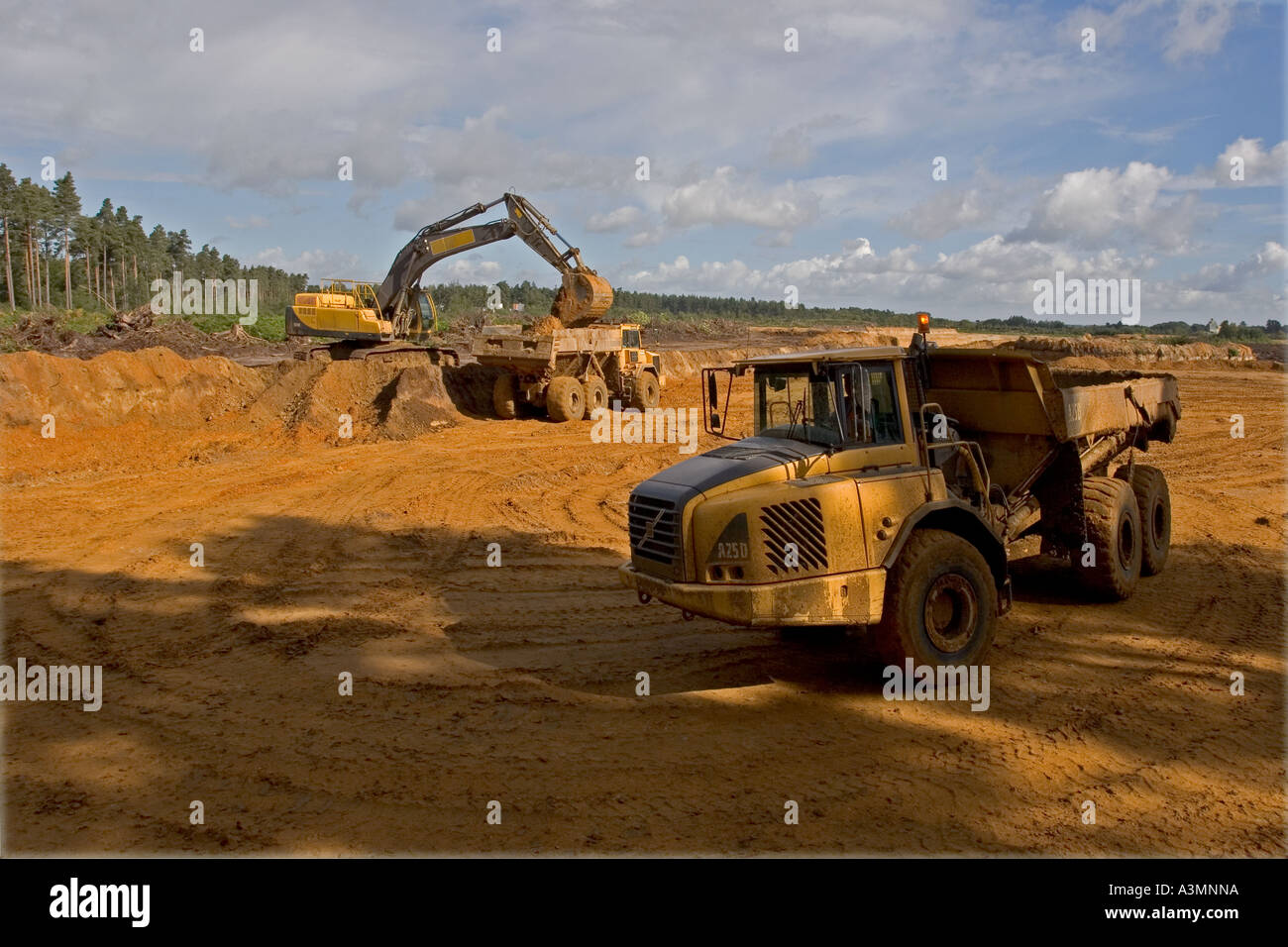 Mining sandstone gravel from quarry, which will be restored to ...